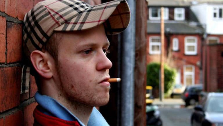 A school teacher was fired after his Youtube rap satire past was unearthed